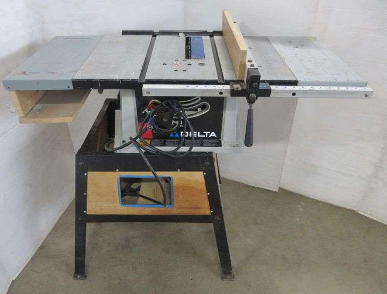 Delta 10" table saw, model 36550 with matching stand, includes (2 ...