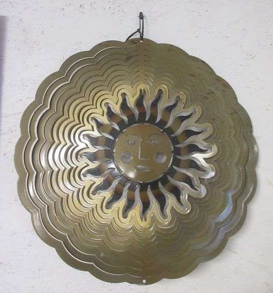 Large twirling metal sun sculpture, 23", good, some rust spots, needs ...