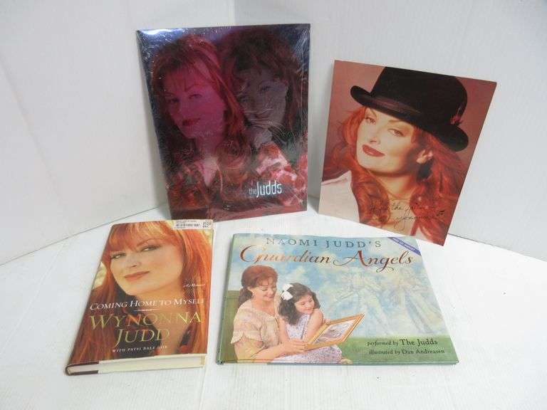 (2) Books, a signed poster/picture, and another book made in 2002 by ...