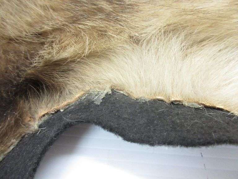 Badger rug, felt bottom, 32"L - Albrecht Auction Service