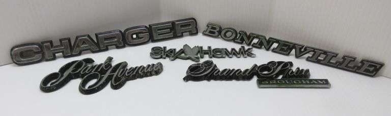 Vintage, various car emblems, includes: Grand Prix, Sky Hawk, Charger ...