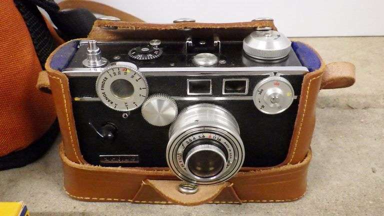 Cameras and lenses, includes: (2) Vintage Argus Fuji Ax multi program ...