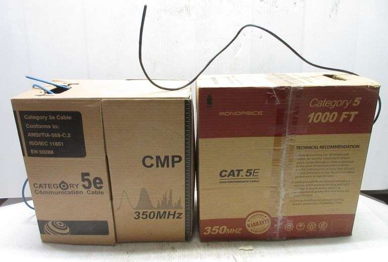 (2) Boxes of CAT.5E wire, one box nearly full, one box half full ...
