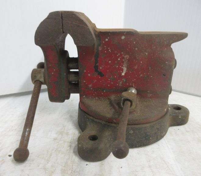 Small vintage red bench vise with swivel base, made by Industrial ...