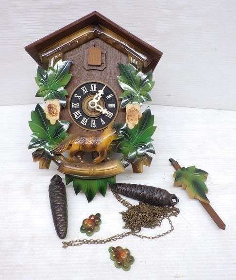 Old cuckoo clock, 8"W x 5 1/2"D x 11"H, two wood grapes came off front ...