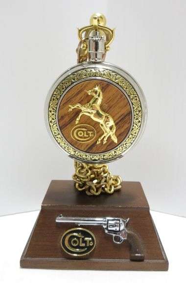Older Colt collector watch and stand - Albrecht Auction Service