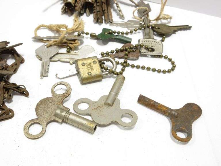 Antique keys, includes: (4) Key rings full of assorted keys, and (3 ...