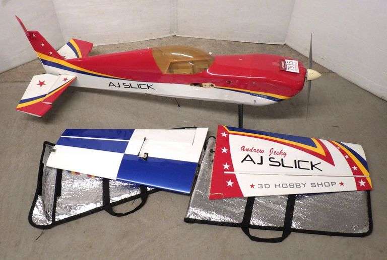 AJ Slick RC plane, 46"L, wings in cases - Albrecht Auction Service