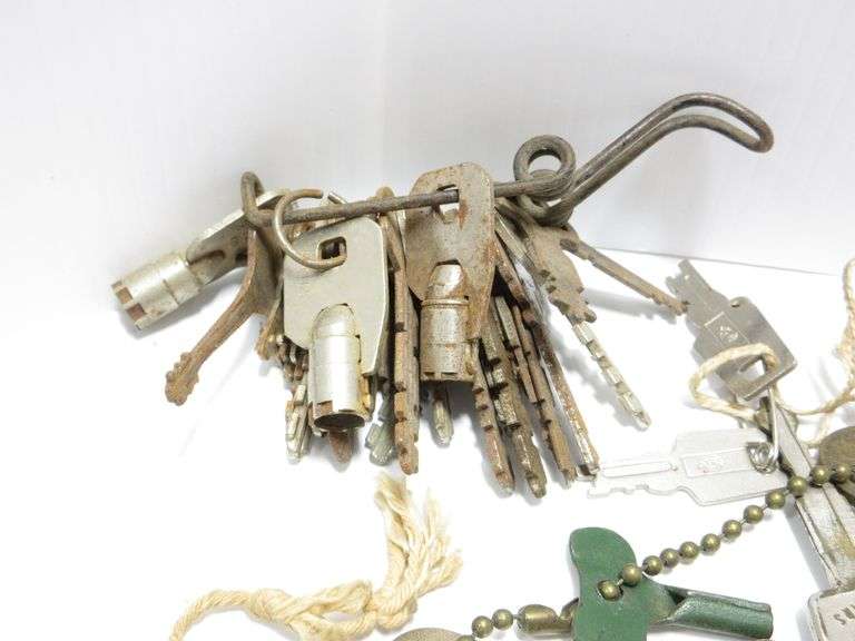 Antique keys, includes: (4) Key rings full of assorted keys, and (3 ...
