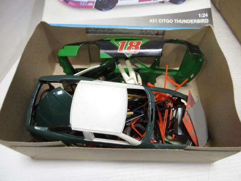 (24) Model kits from the 90s, include: 22- Nascar, 1- Indy car, 1 ...
