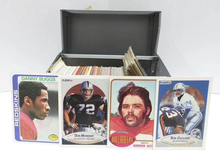 Older box lot of football cards, includes: Various teams and players ...