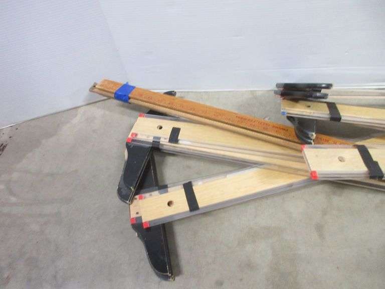 (16) Drafting sticks, and (4) Yard sticks - Albrecht Auction Service
