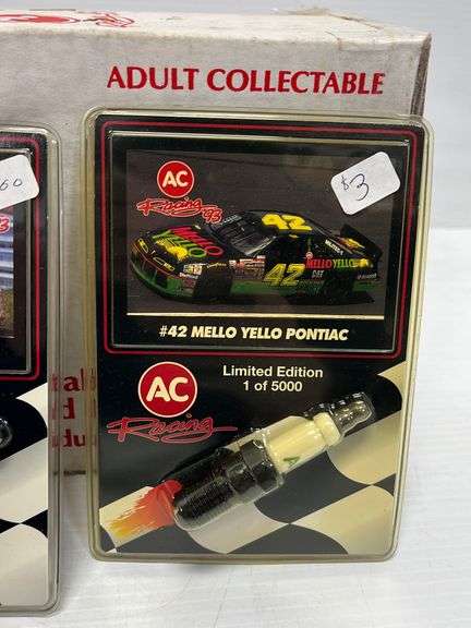 (2) Boxes of AC collectible spark plugs and racing trading cards from ...