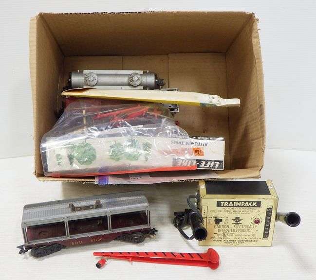 Train items, includes: Train pack controller, (6) Lionel trains cars ...