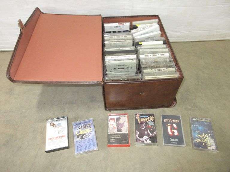 Assorted cassette tapes, includes: Garth Brooks, George Thorogood ...