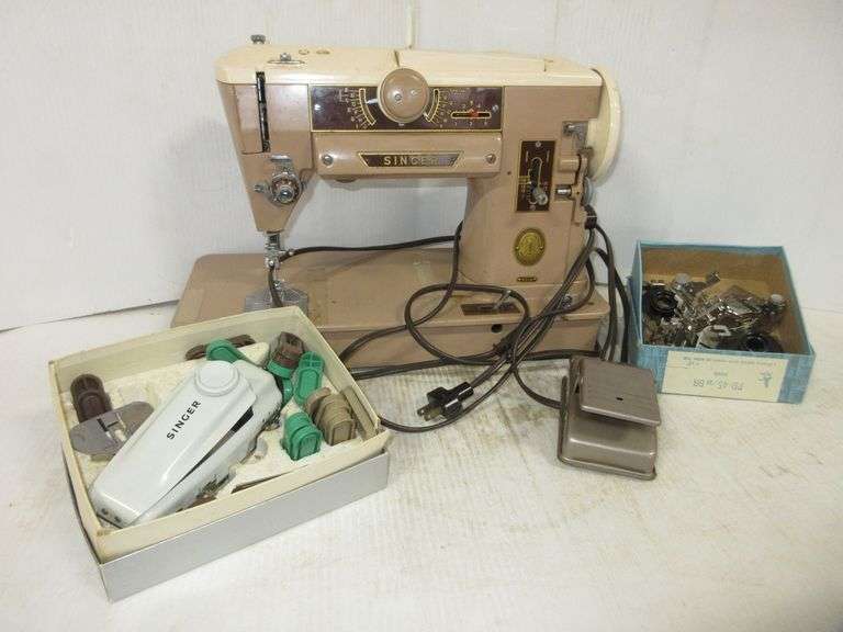 Singer 401A sewing machine with singer button holder and spare parts ...