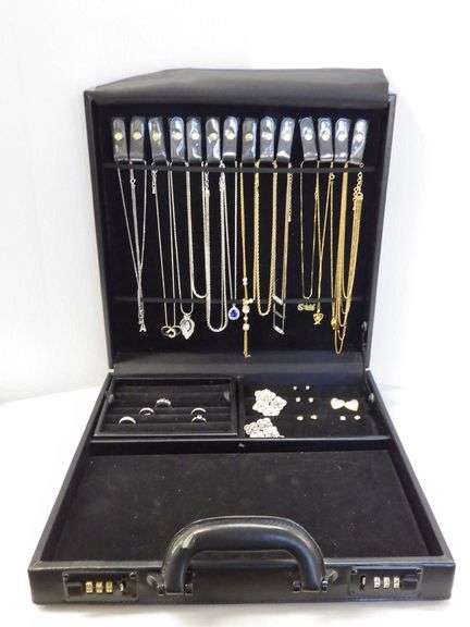 Leather briefcase with over (14) necklaces, silvertone and goldtone; (5 ...