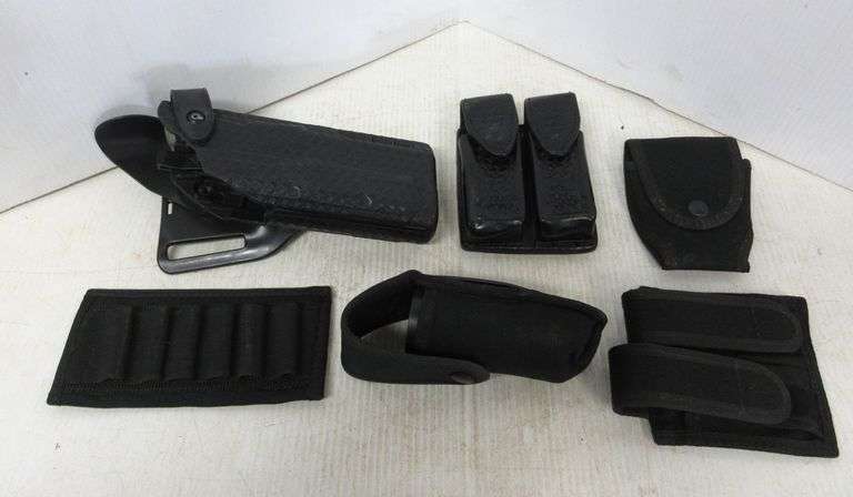 (2) Dual mags, holster, mace, handcuffs, and shotgun shell holder ...