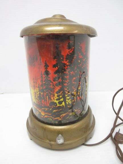 1950s Roto-Vue lamp, made by Sconolite Corp., displays forest fire ...