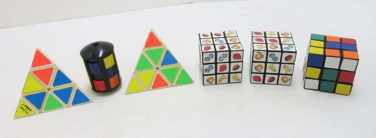 Rubik's cube type puzzles, includes: Rubik's cube, (2) Chex Brand fruit ...