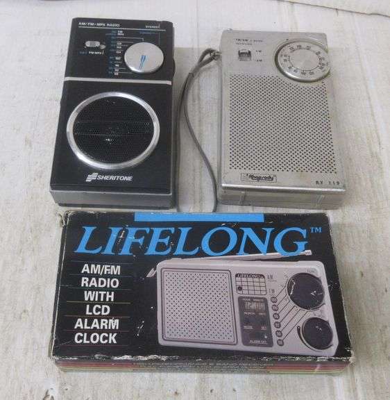 Rhapsody R4119 AM/FM handheld radio; Sheriton AM/FM MRX handheld radio ...