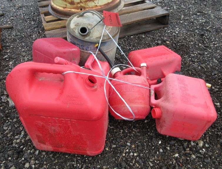 Galvanized kerosene can, and (6) Gas cans - Albrecht Auction Service