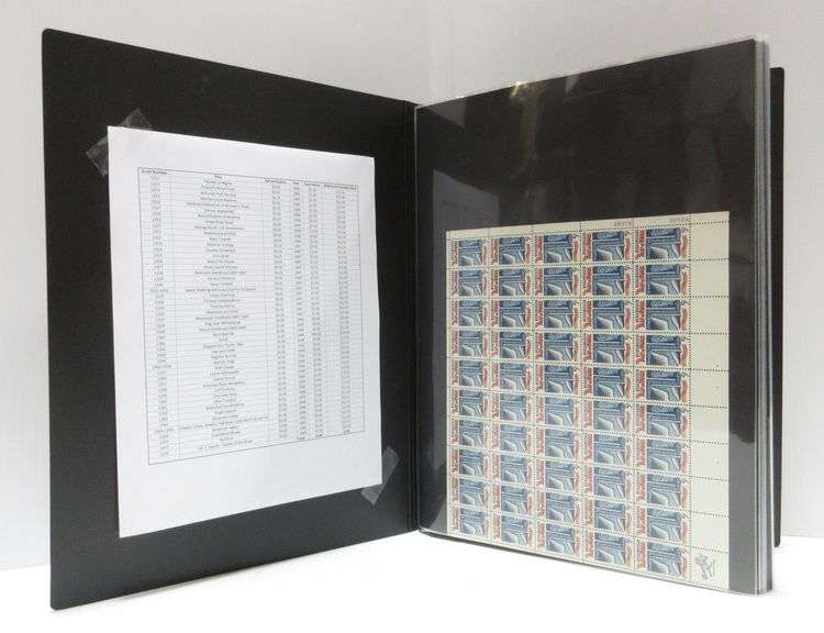 Collection of US mint never hinged stamp full sheets in a black Itoya ...