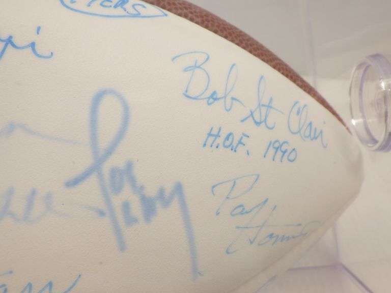 Autographed footed 16 signatures, includes: Jim Brown, Bart Starr, Otto ...