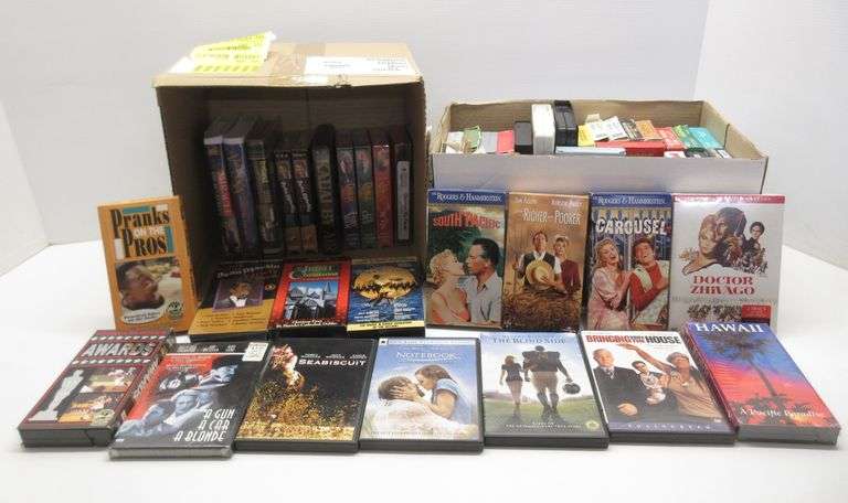 Assorted VCR tapes and DVDs, most used, some new - Albrecht Auction Service