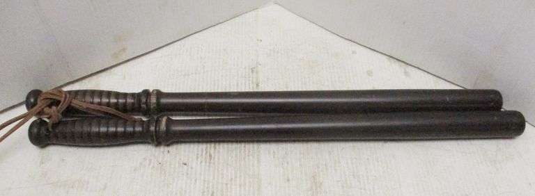 Pair of night sticks/billy clubs, up to 22"L - Albrecht Auction Service