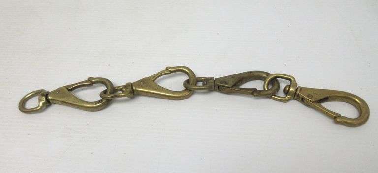 Four- 4" Brass swivel eye snaps - Albrecht Auction Service