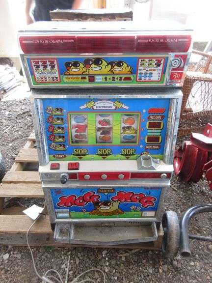 Token slot machine, 32 1/2"H, light up but does not work, as is ...