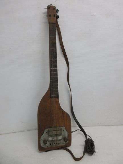 Four-string pick electric guitar, Eye-Beam electro muse, 28 1/2"H, I ...