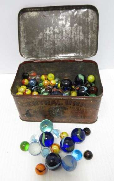 Tin with old marbles, tin- 6"W x 3"H - Albrecht Auction Service