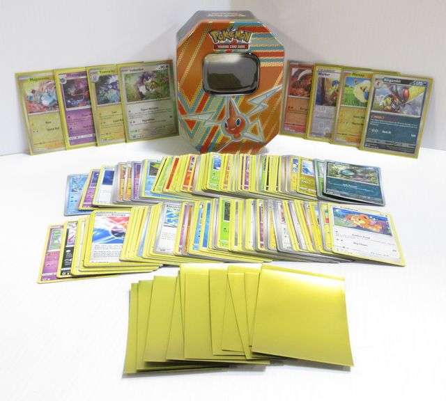 Pokemon cards, collectors tin with over (200) cards, sleeves, rare and ...