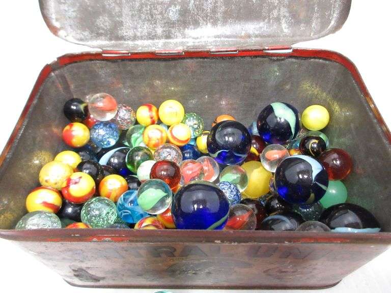 Tin with old marbles, tin- 6"W x 3"H - Albrecht Auction Service
