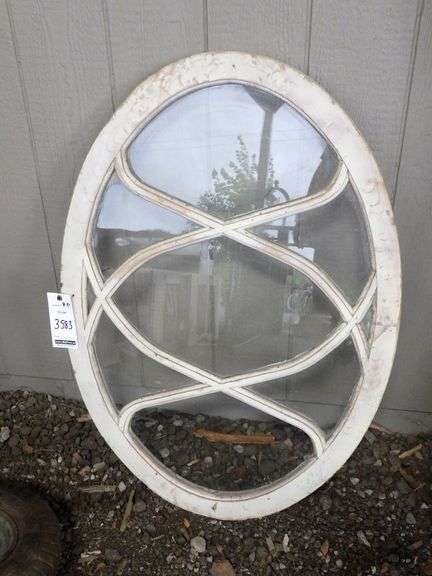 Large oval window, 41" x 30", one piece of glass has been replaced ...