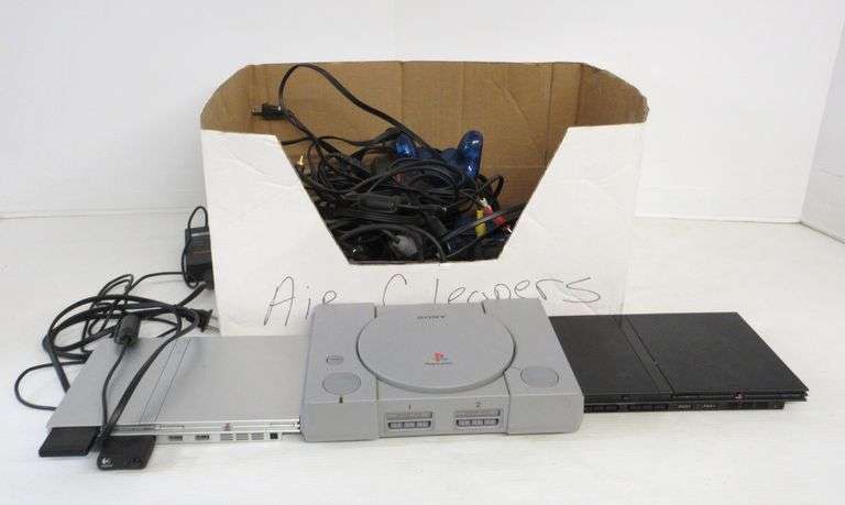 Original Playstation system and (2) Playstation 2 systems, with (6 ...