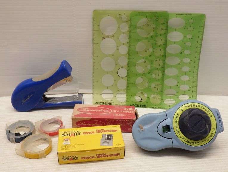 Label maker with extra strip cartridges; Stapler and box of staples ...