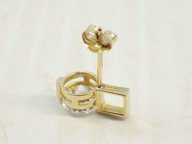 (3) Pairs of 14K Pierced post style earrings, center pair has genuine ...