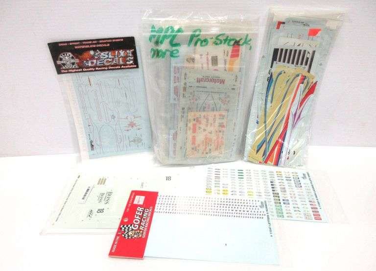 Large assortment of older and current auto model and airliner decals ...