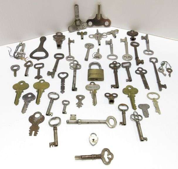 Older keys, clock keys, bottle opener, cabinet key, skeleton keys ...