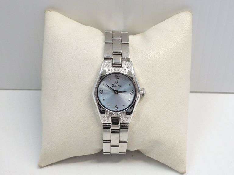 Diamond bulova watch, 16 diamonds, pave set at top and bottom of dial ...