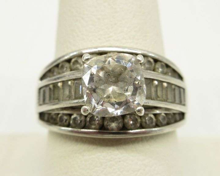 Silver ring, size 9, with cubic zirconia, .925, marked; Except where ...