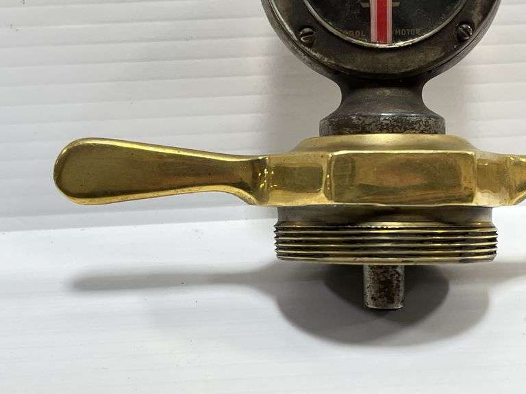 Older Boyce motometer midget model attached to a solid brass dog bone ...