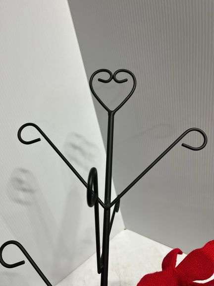 Black metal mitten drying rack, 38"H - Albrecht Auction Service