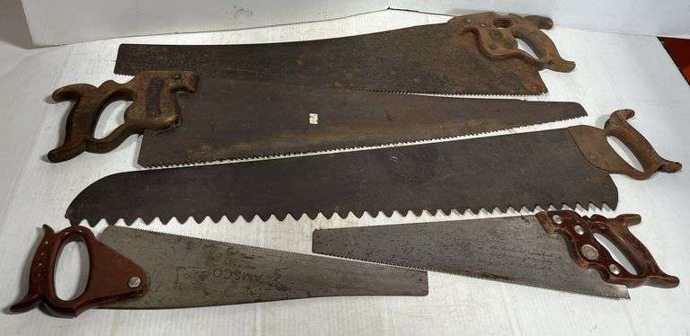 (5) Older hand saws with decorative designs engraved, some handles, one ...