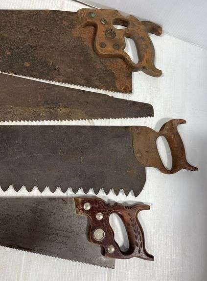 (5) Older hand saws with decorative designs engraved, some handles, one ...