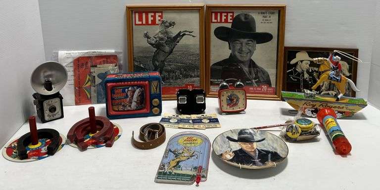 Roy Rogers collectibles, includes: Clock, framed magazines, camera, and ...