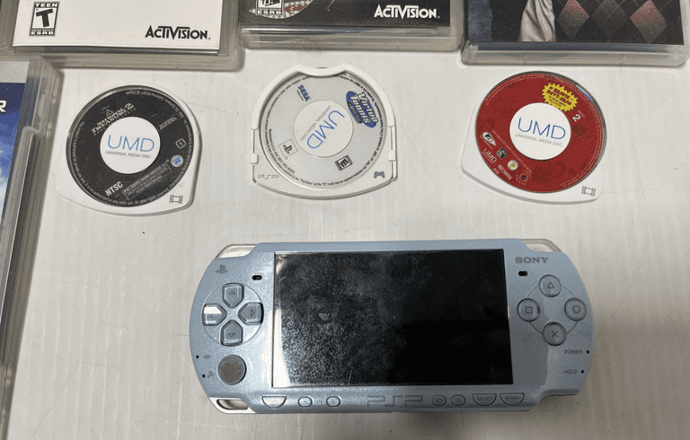 Sony PSP unit, has no battery or power cord; (3) games: 2- World Series ...